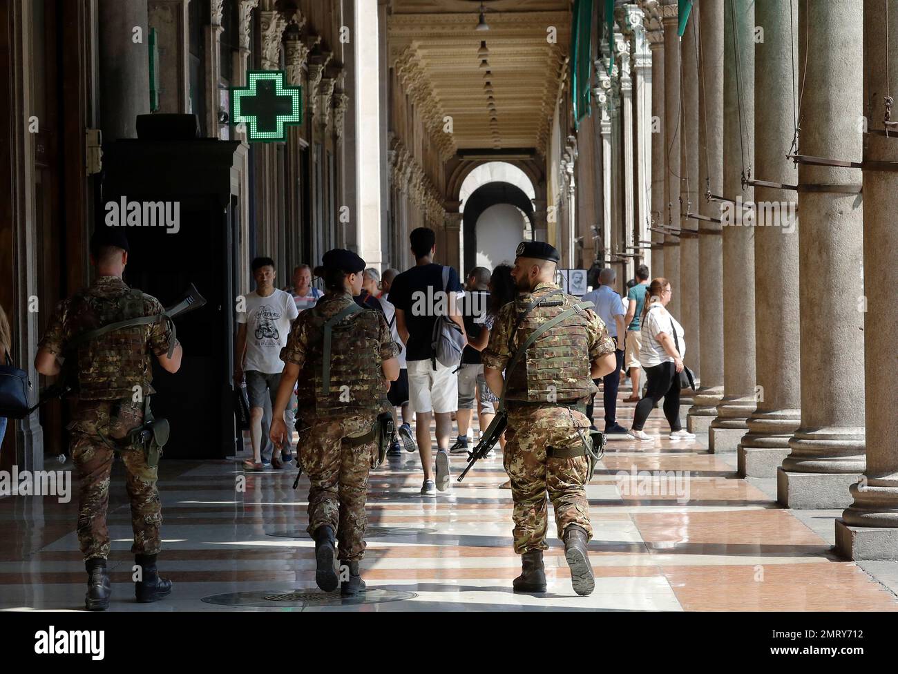 Soldiers patrol the area of Duomo square in Milan, Italy, Friday, Aug ...