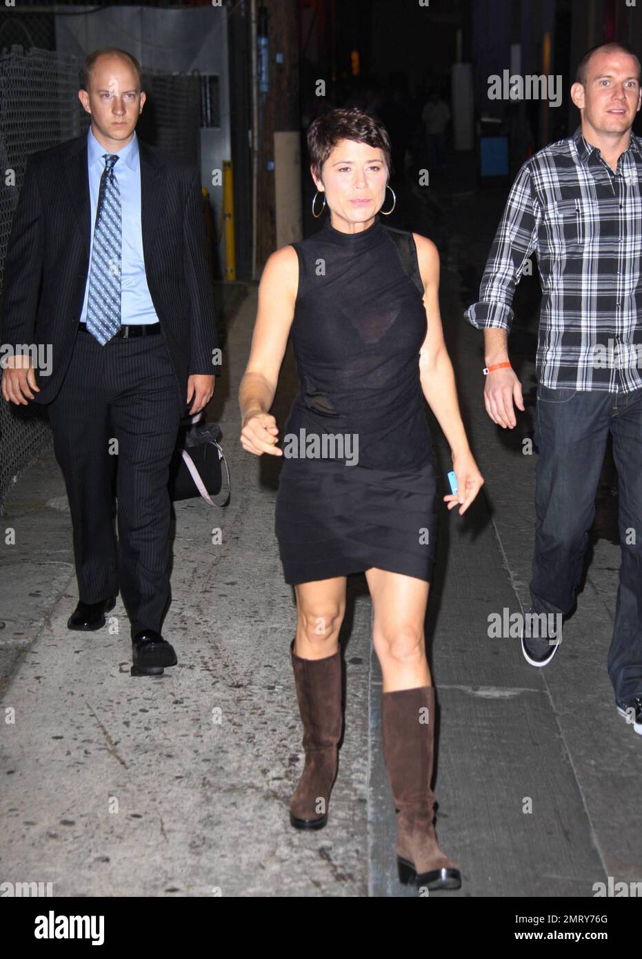 Maura Tierney signs autographs for fans as she leaves the "Jimmy Kimmel ...