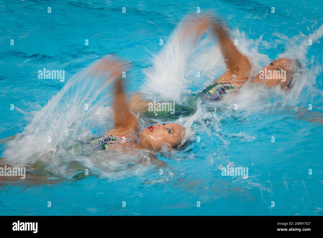 Malaysia's Gan Hua Wei and Lee Ying Huey compete during Duet Technical Routine synchronized ...