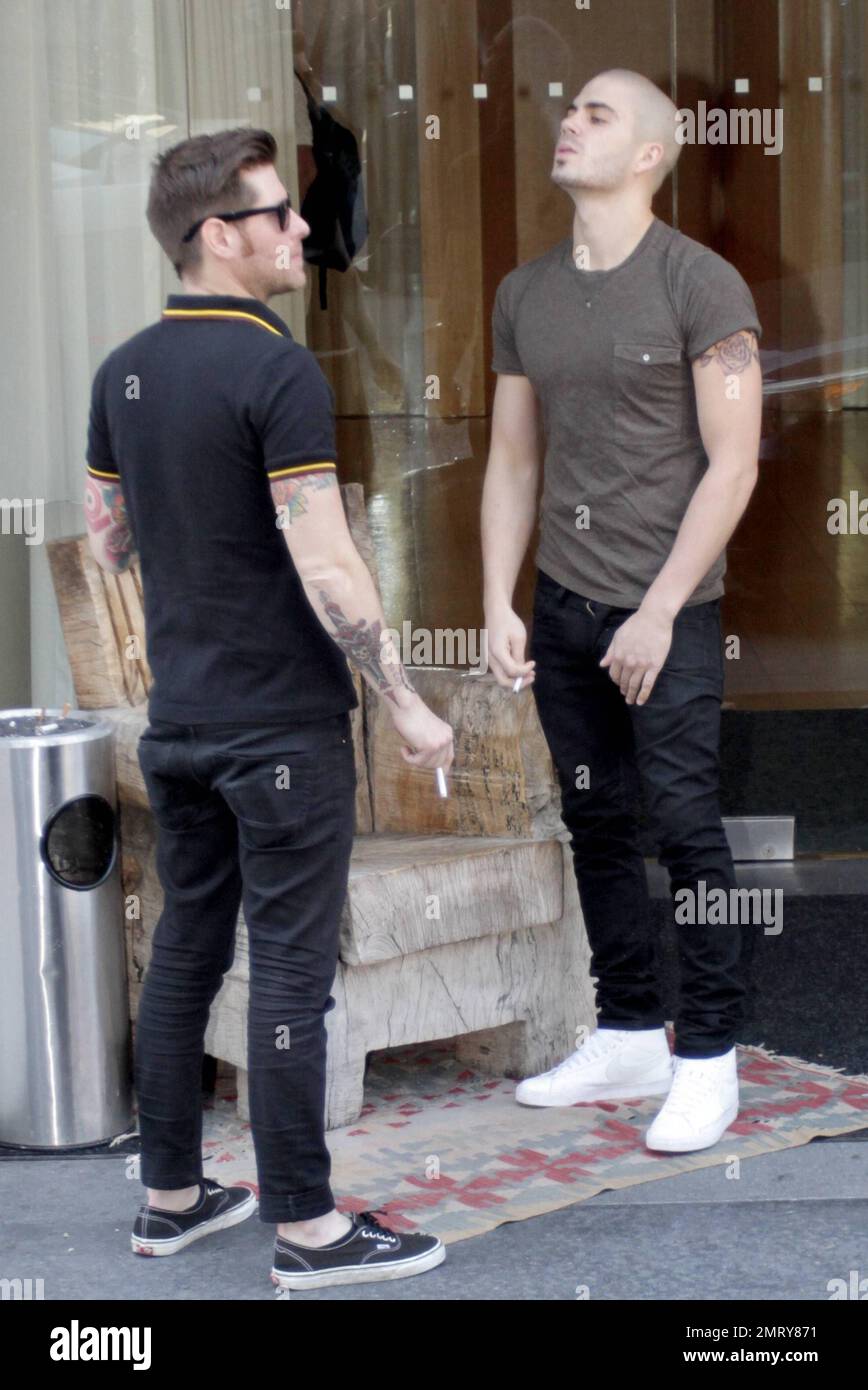 Max George of the UK boy band The Wanted shows off his tattoos while ...