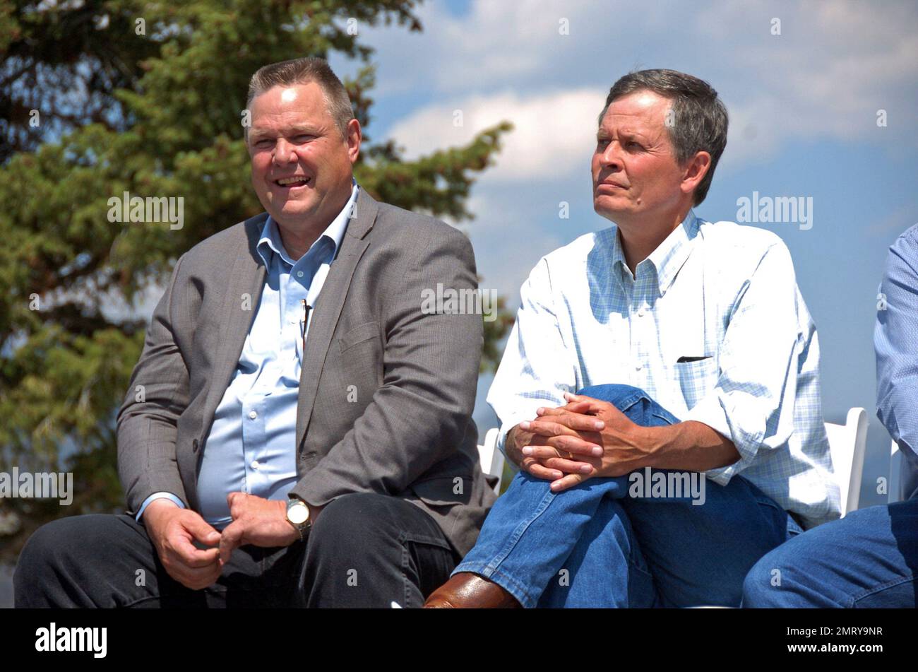 U.S. Senators Jon Tester, left, and Steve Daines appear at a signing ...