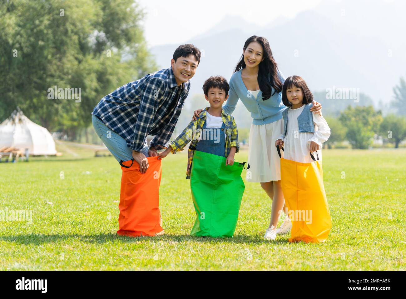 Four happy hi-res stock photography and images - Alamy