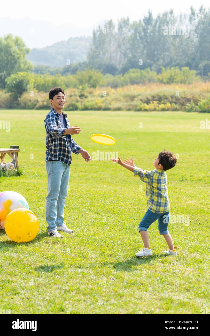 Father son cheers hi-res stock photography and images - Alamy