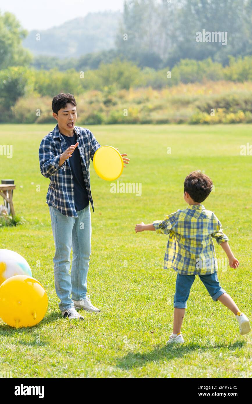 Father son cheers hi-res stock photography and images - Alamy