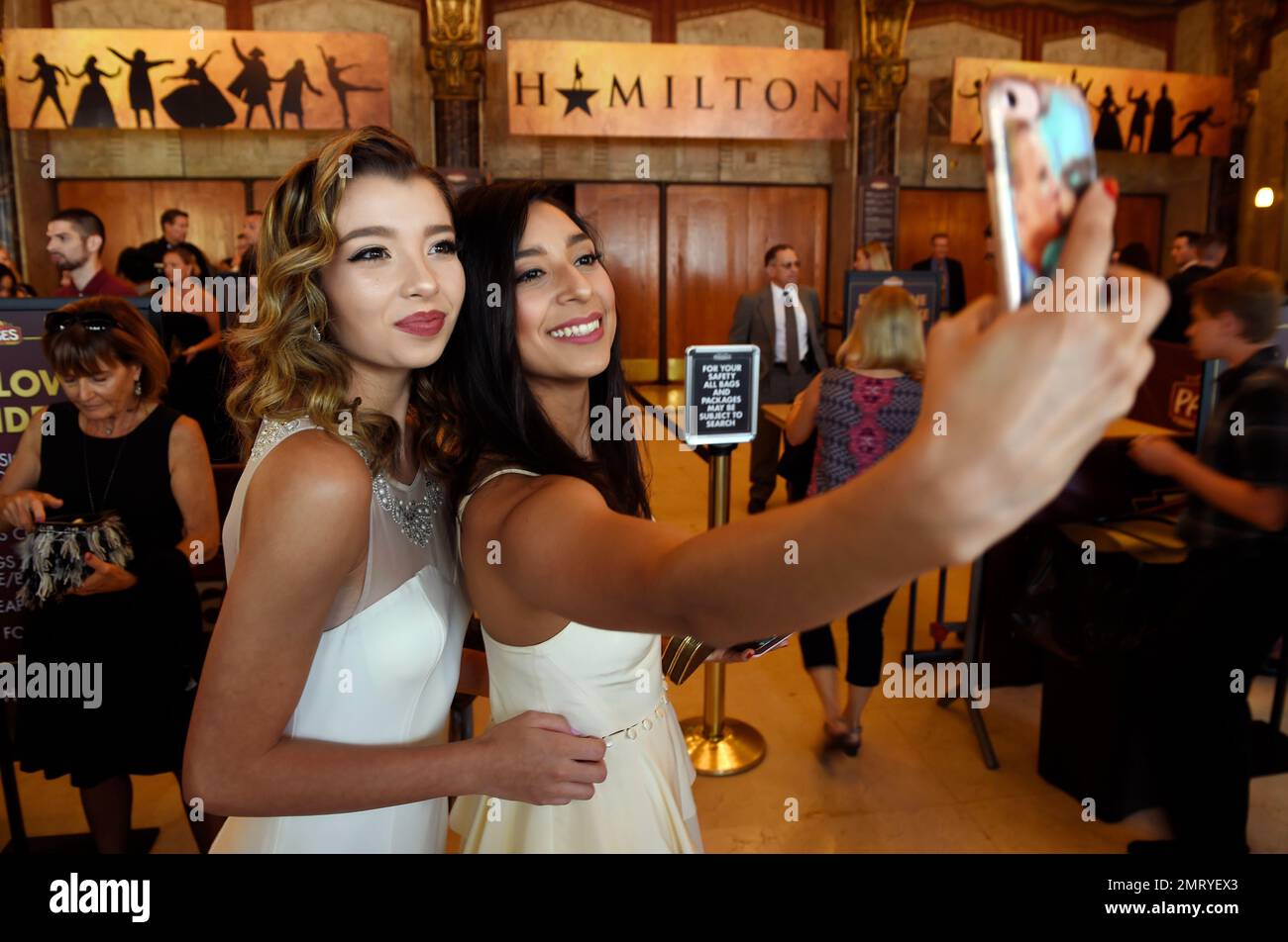 Sisters Brooke, left, and Lauren Boyd of Los Angeles shoot a selfie of ...