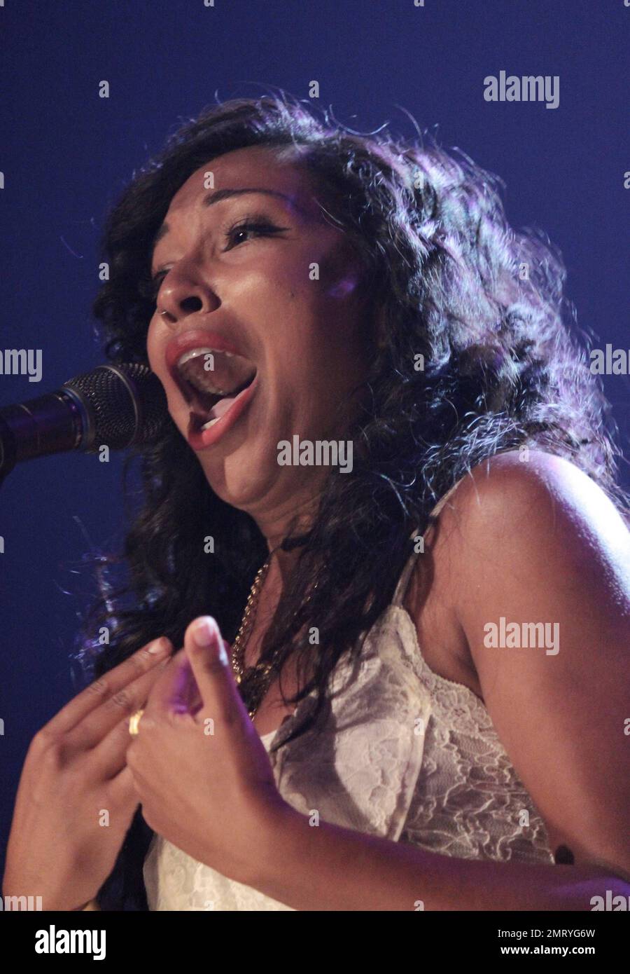 R&B singer Melanie Fiona performs during the McDonald's 365 Black ...
