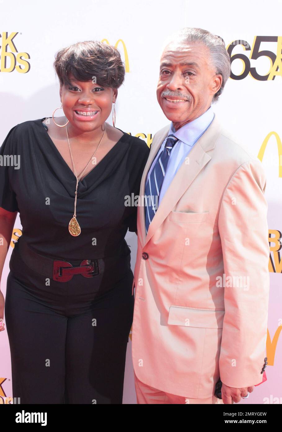 C Youth activist (and honoree) Mary Pat Hector and the Reverend Al ...