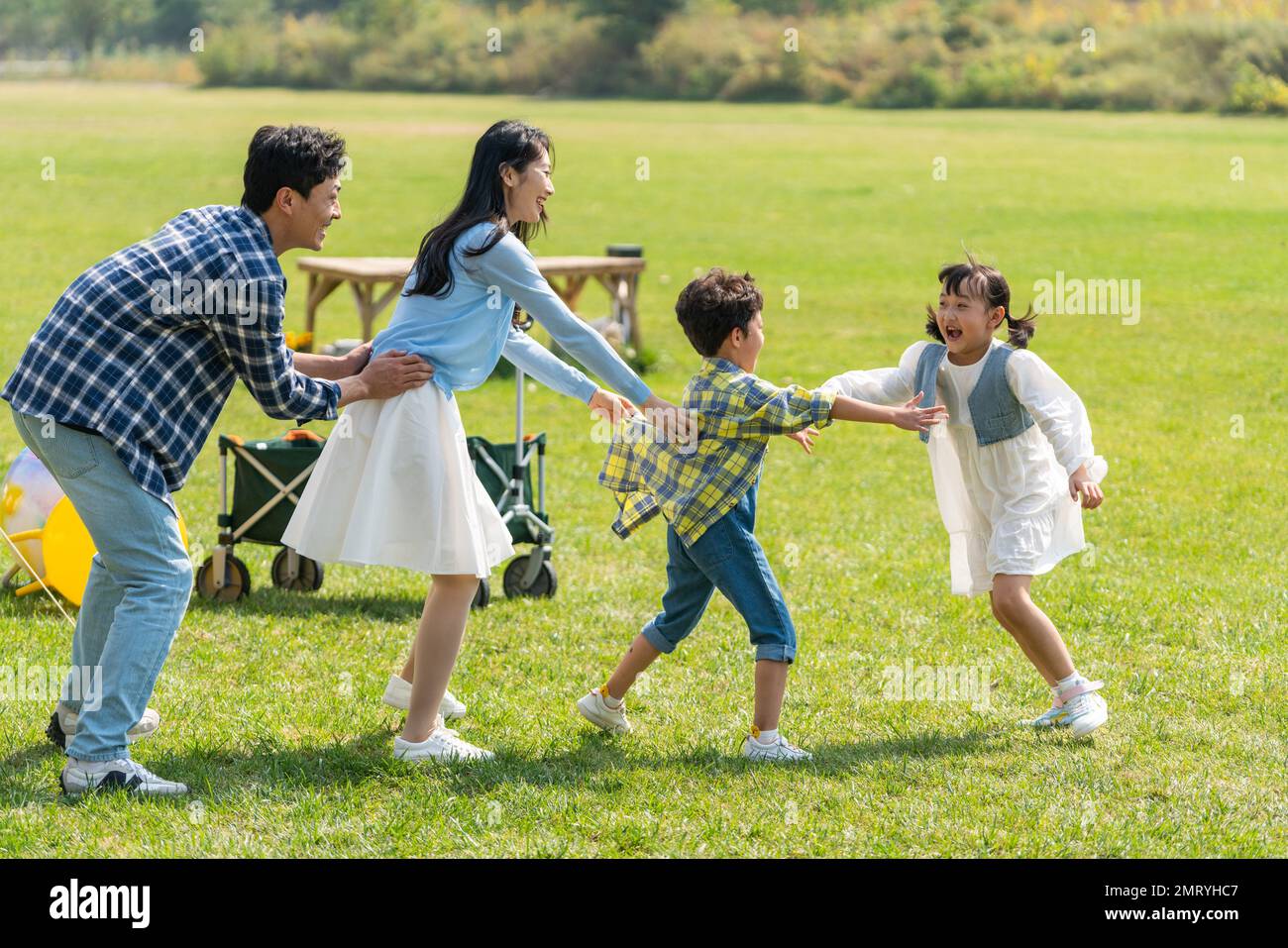 Many arms woman children hi-res stock photography and images - Alamy
