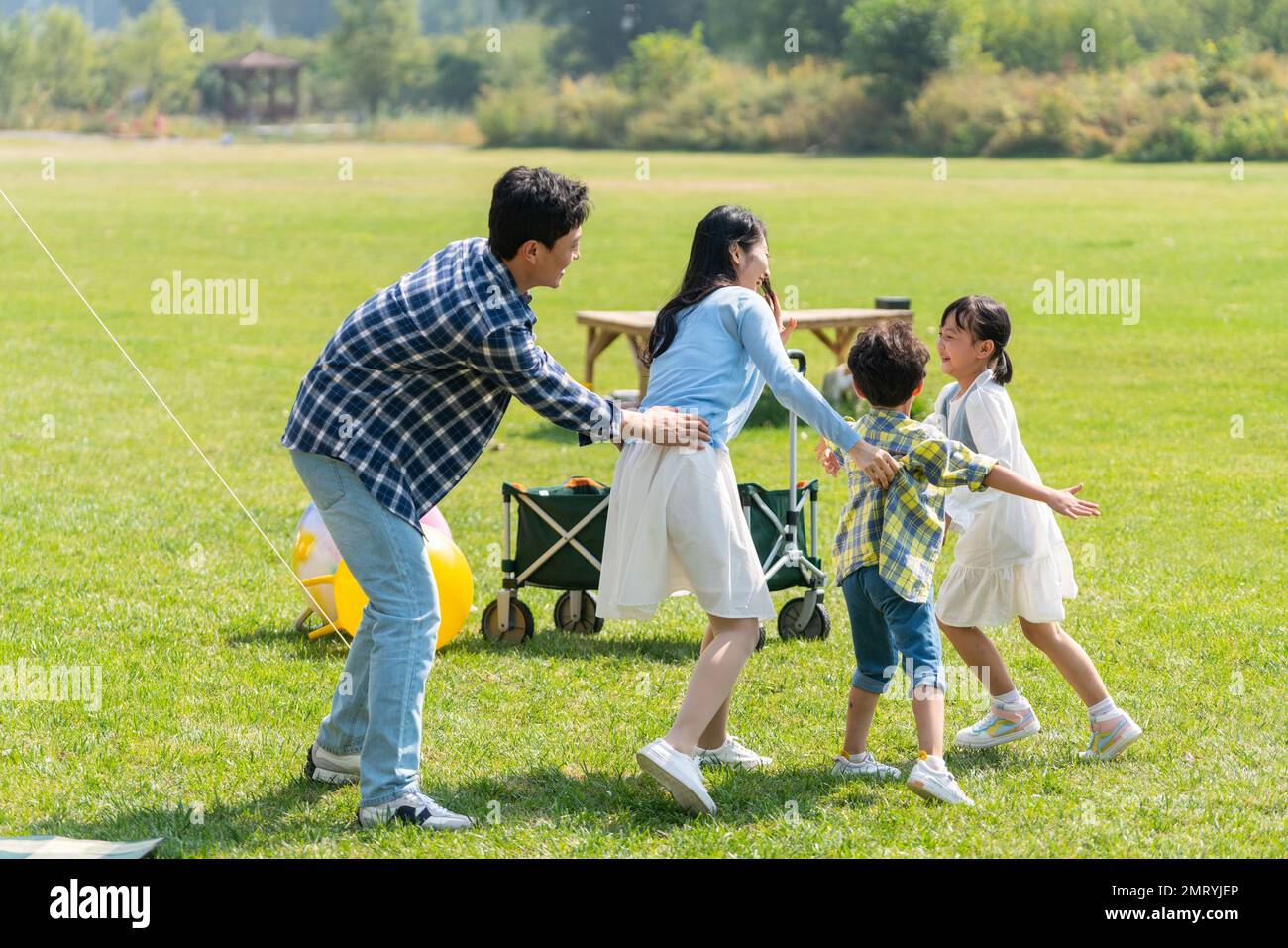 Many arms woman children hi-res stock photography and images - Alamy