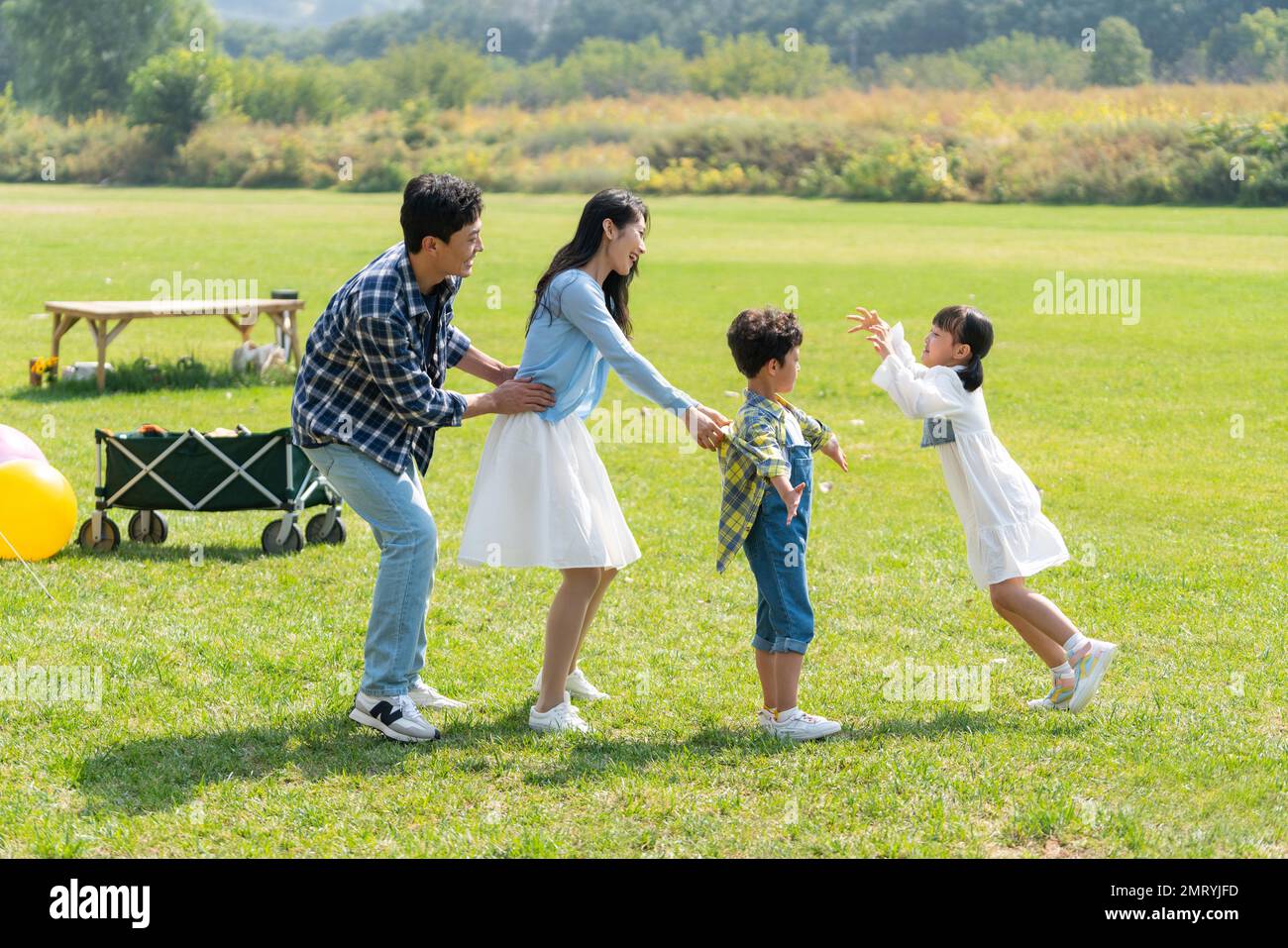 Many arms woman children hi-res stock photography and images - Alamy