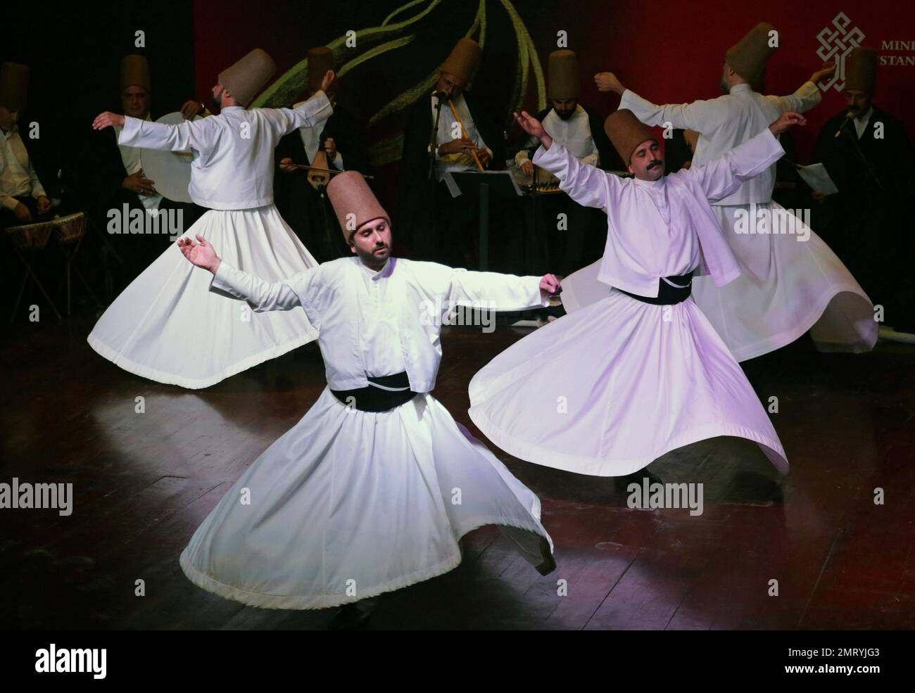 Visiting Sufi Muslim dervishes from Turkey whirl on stage as part of ...