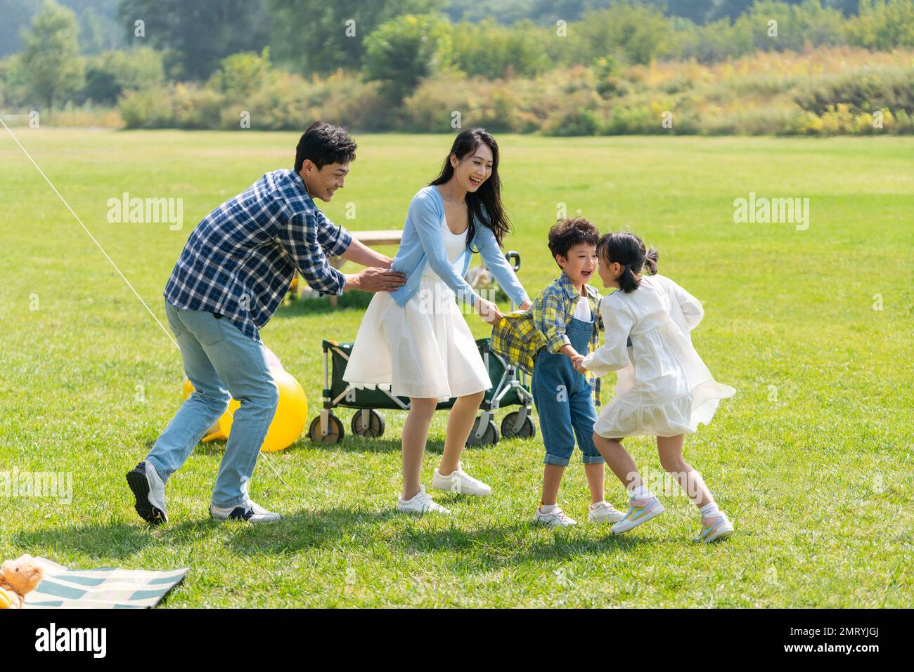 Many arms woman children hi-res stock photography and images - Alamy