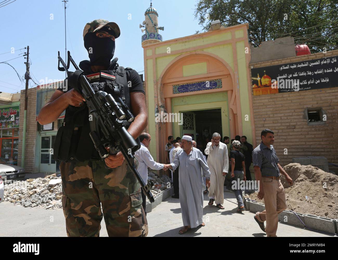 FILE - In this June 20, 2014 file photo, a fighter of the Mahdi Army ...