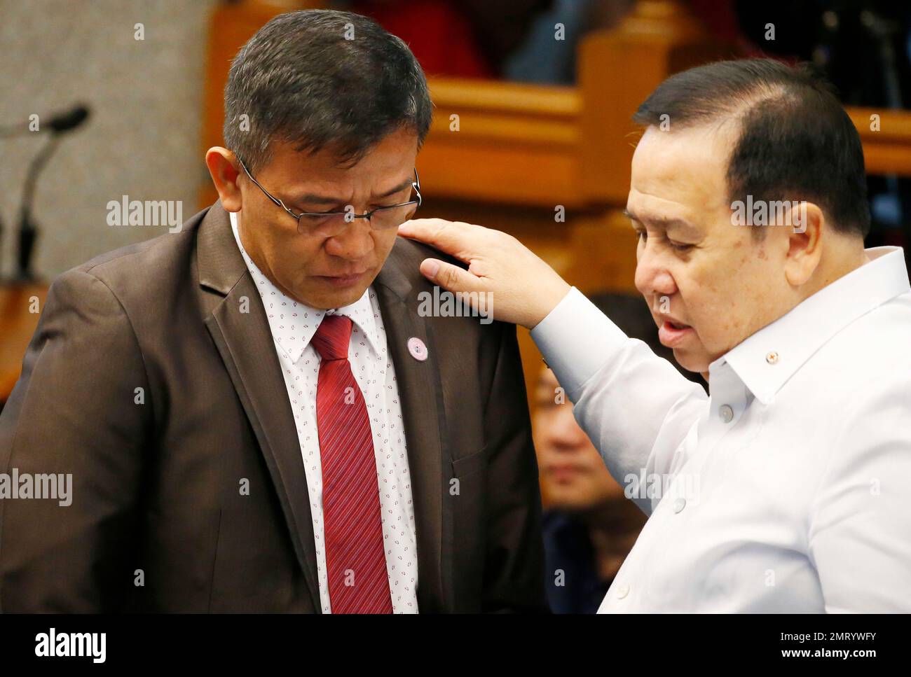 An emotional Philippine Customs Commissioner Nicanor Faeldon talks to ...