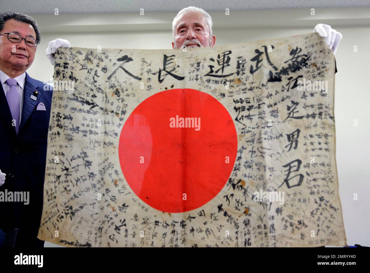 In this Aug. 13, 2017 photo, former U.S. Marine Marvin Strombo, right ...