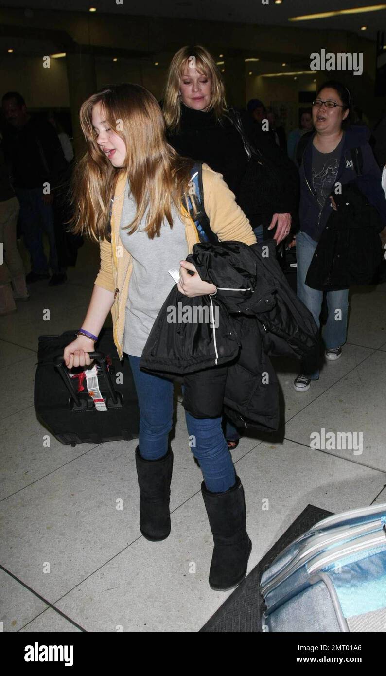 Melanie Griffith, looking fabulous as usual, arrives at LAX airport all ...