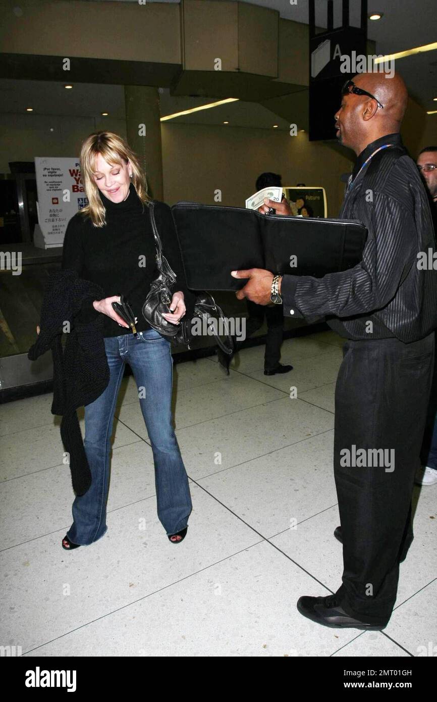 Melanie Griffith, looking fabulous as usual, arrives at LAX airport all ...