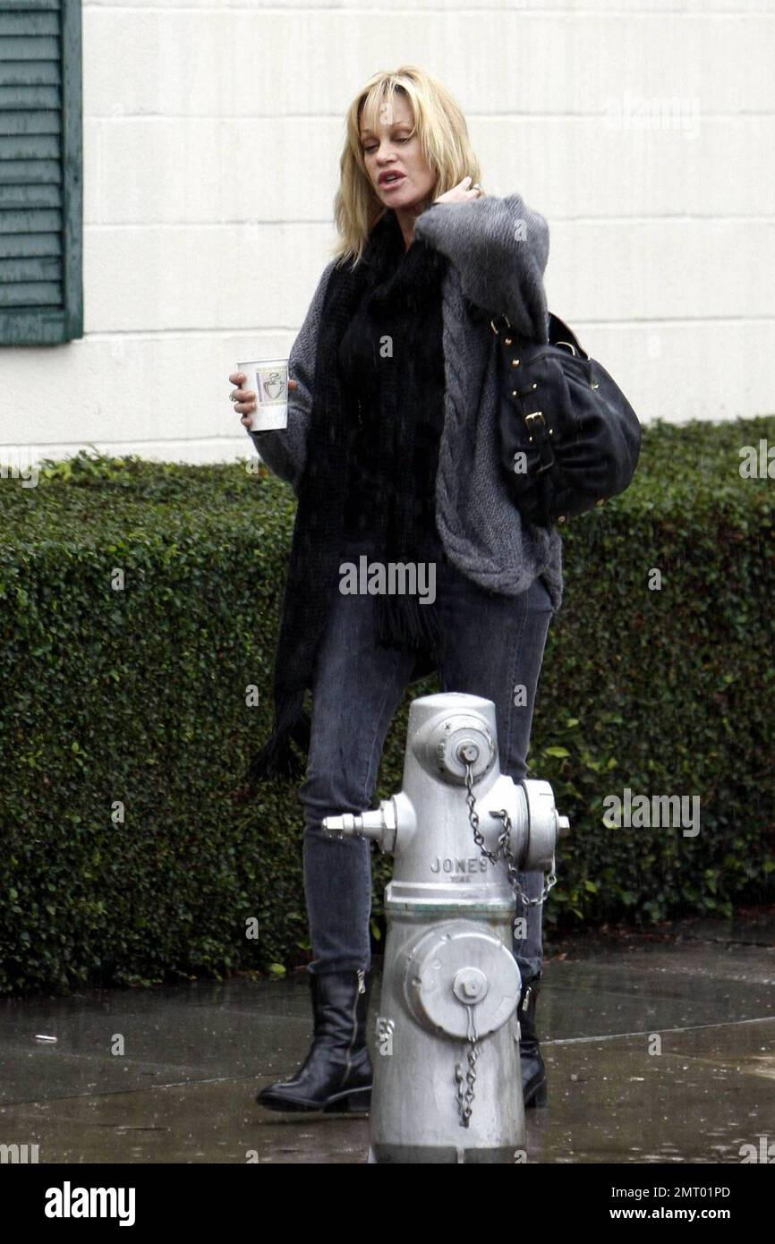 Melanie Griffith looks like she's getting a bit waterlogged as she ...