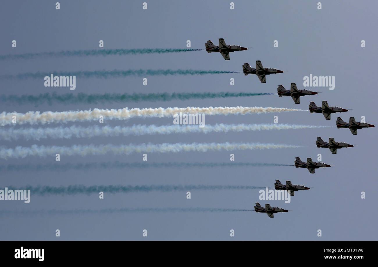 Pakistani Air Force fighter jets perform an aerobatic stunt during an ...