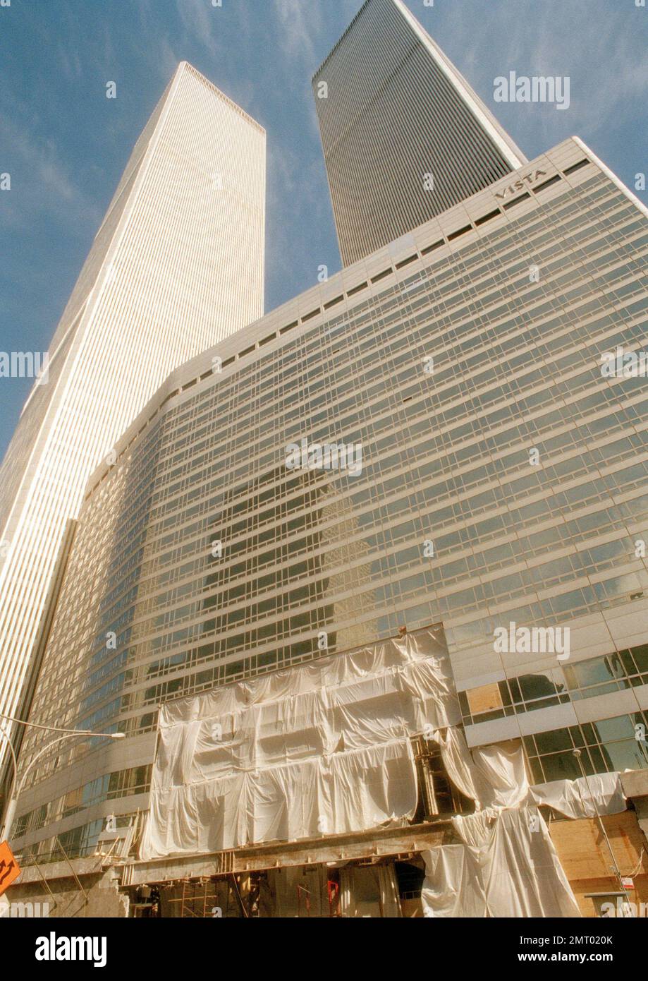 Tarps cover part of the facade of the Vista Hotel as the World Trade ...