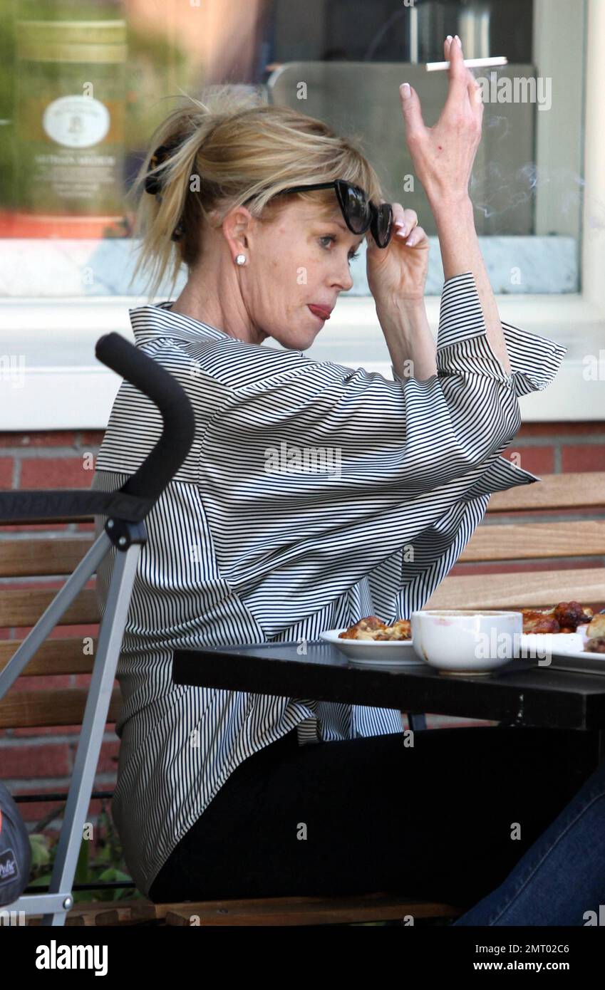 EXCLUSIVE!! Wearing a pair of cat-eye sunglasses, Melanie Griffith ...