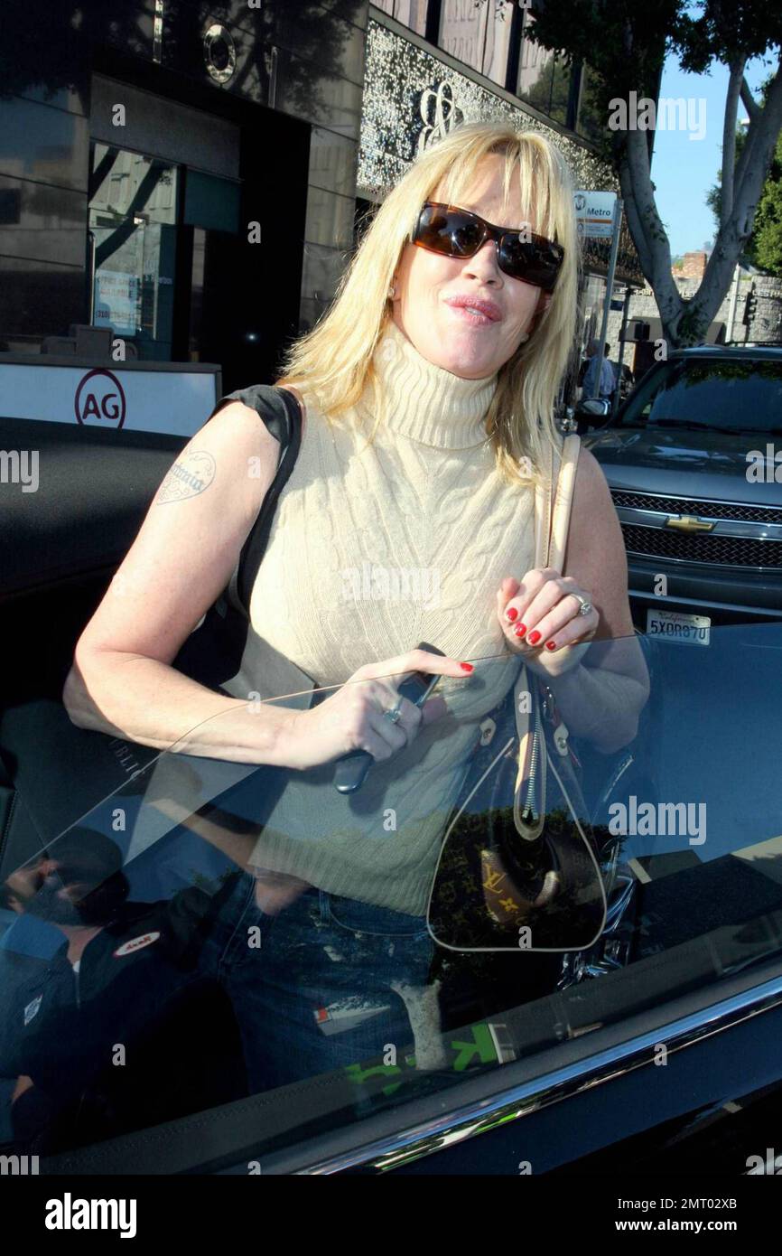 Melanie Griffith looks as gorgeous as ever in a casual outfit while out ...