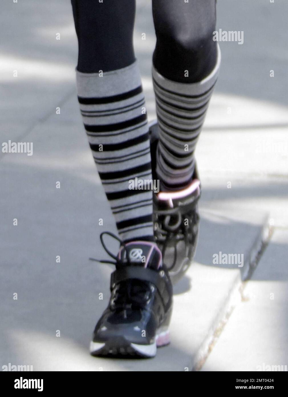 EXCLUSIVE!! Wearing an all black outfit, accessorized with funky ...