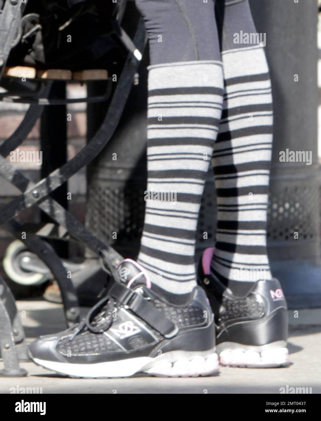 EXCLUSIVE!! Wearing an all black outfit, accessorized with funky ...