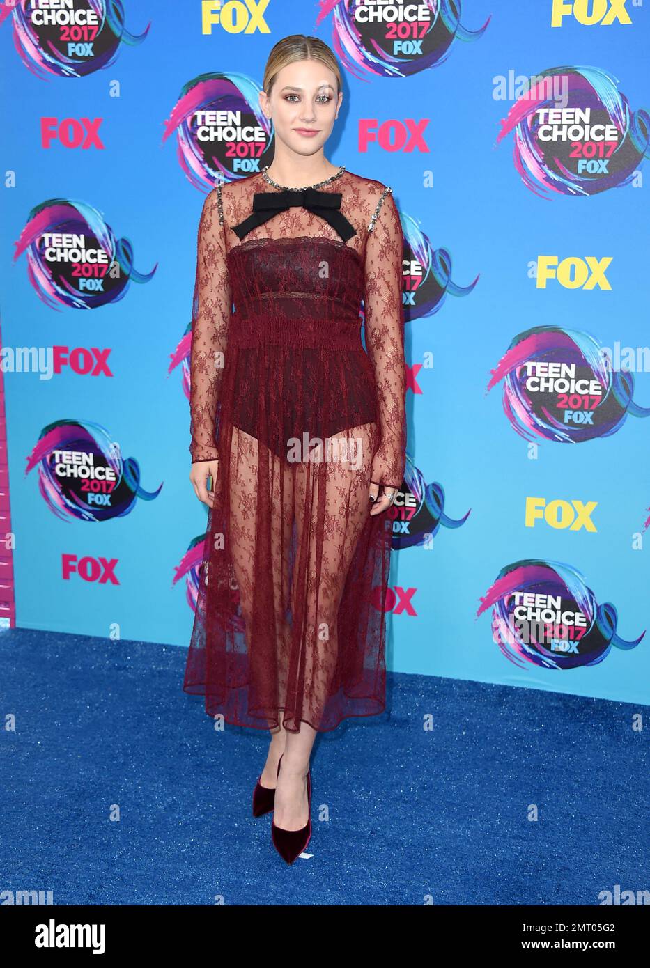 Lili Reinhart arrives at the Teen Choice Awards at the Galen Center on ...