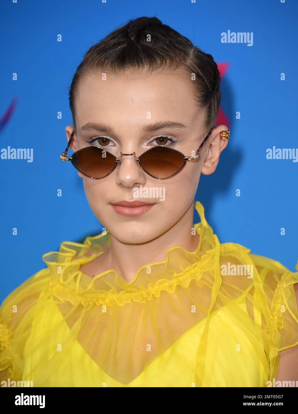 Millie Bobby Brown arrives at the Teen Choice Awards at the Galen ...