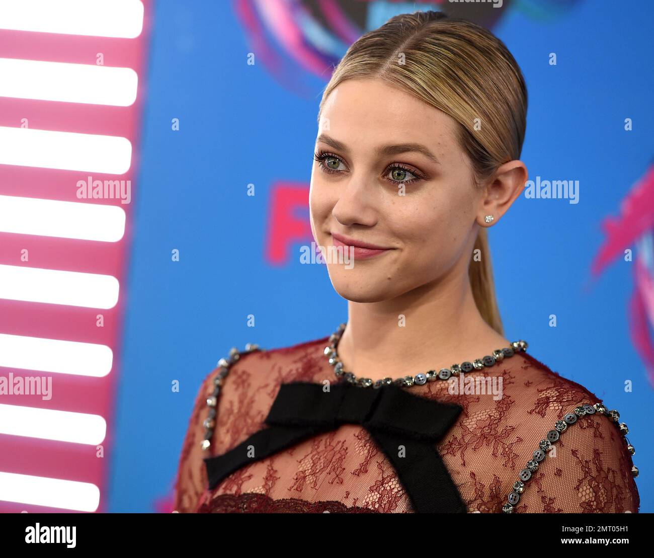 Lili Reinhart arrives at the Teen Choice Awards at the Galen Center on ...