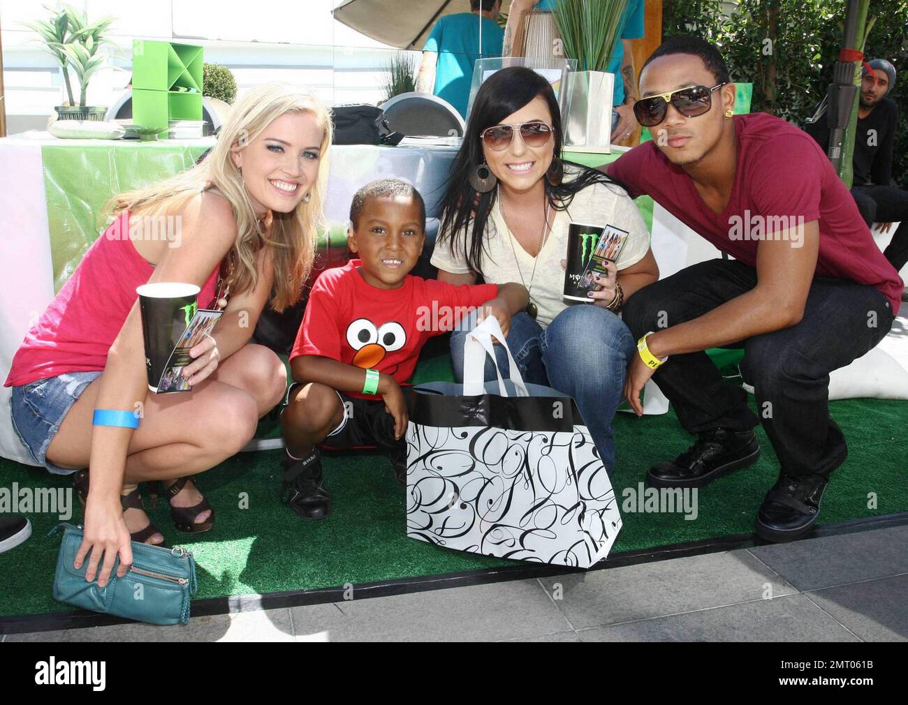 Amber Meade (L), guest, Sarah Michaels and singer Romeo Miller (aka Lil ...