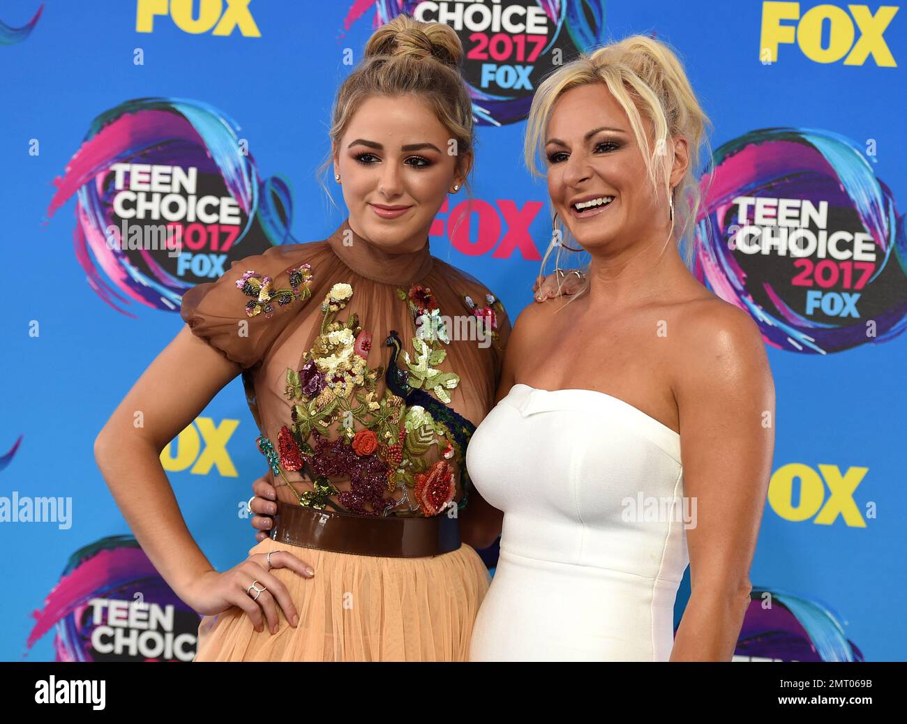 Chloe Lukasiak, left and her mother Christi Zook Lukasiak arrives at ...