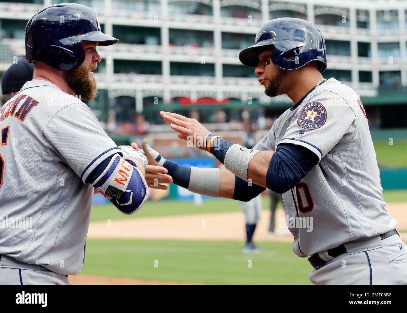 Houston Astros' Brian McCann congratulates Yuli Gurriel, right, on ...