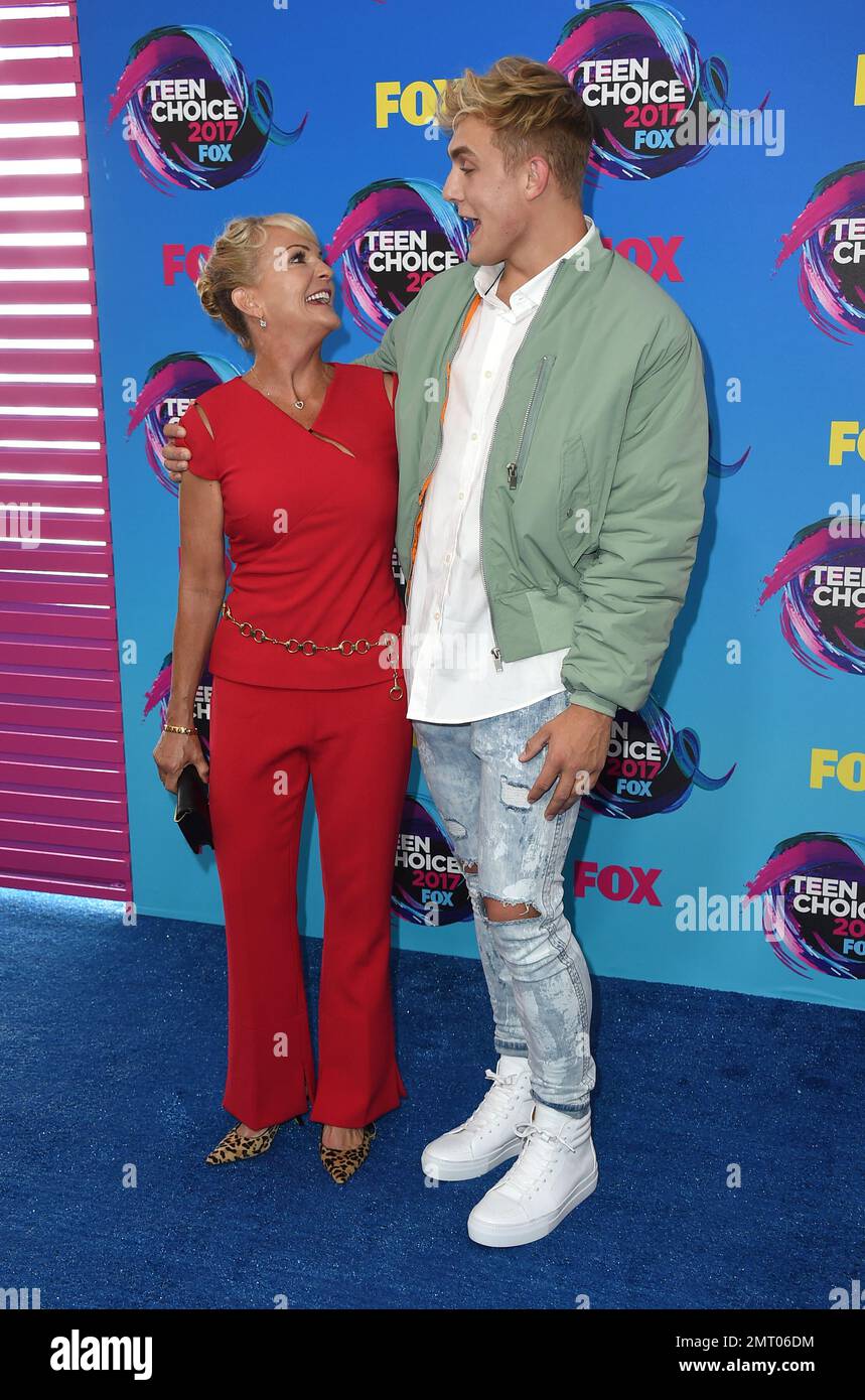 Jake Paul, right and his mother Pam Stepnick arrive at the Teen Choice ...