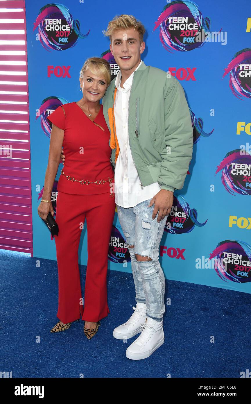 Jake Paul, right and his mother Pam Stepnick arrive at the Teen Choice ...