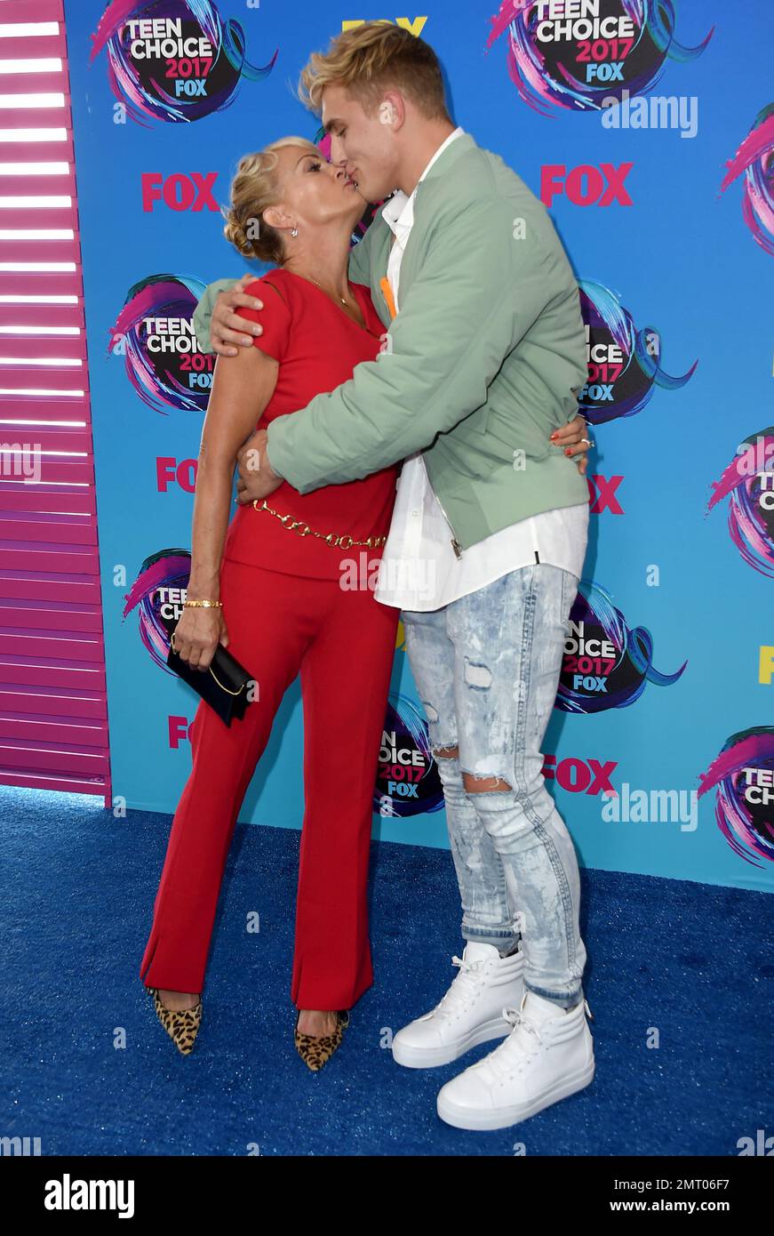 Jake Paul, right and his mother Pam Stepnick arrive at the Teen Choice ...