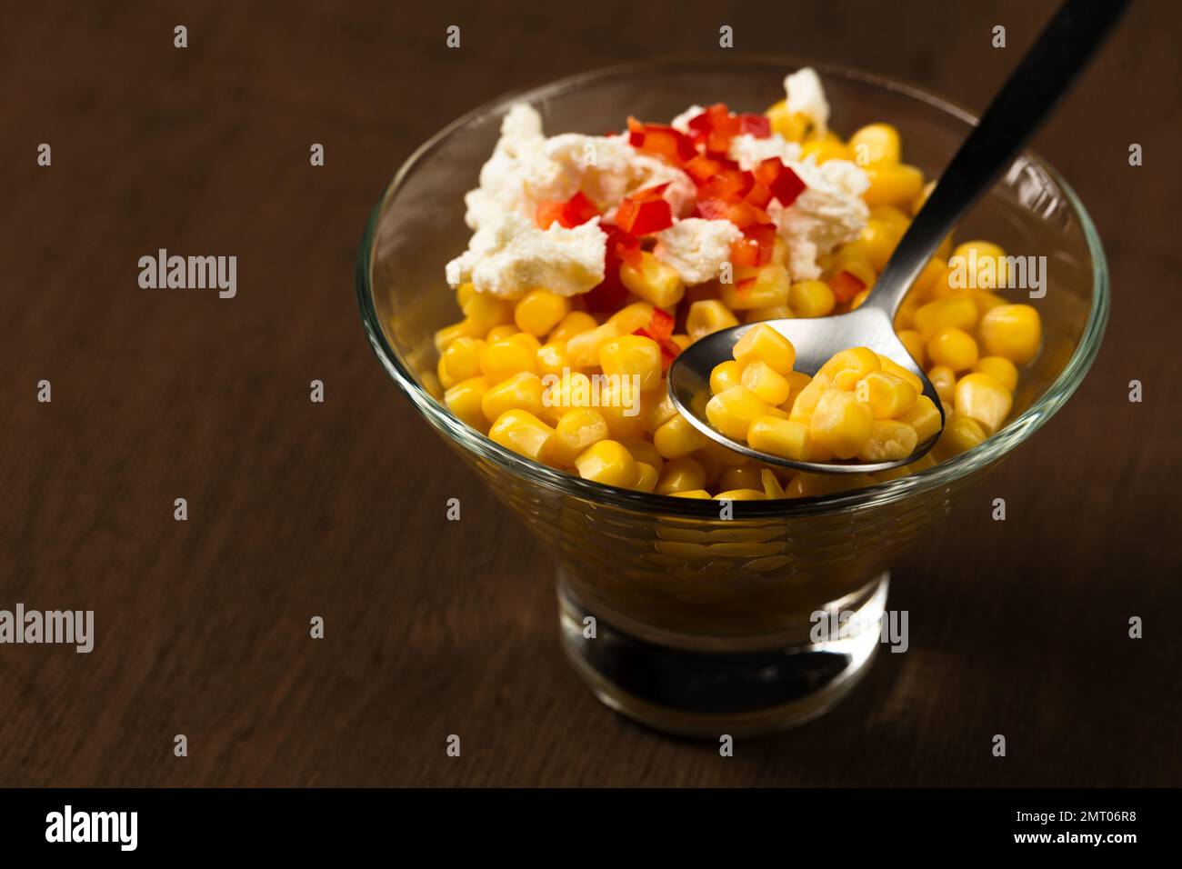 Esquites or Trolley with corn, cheese, mayonnaise and chili in a glass ...