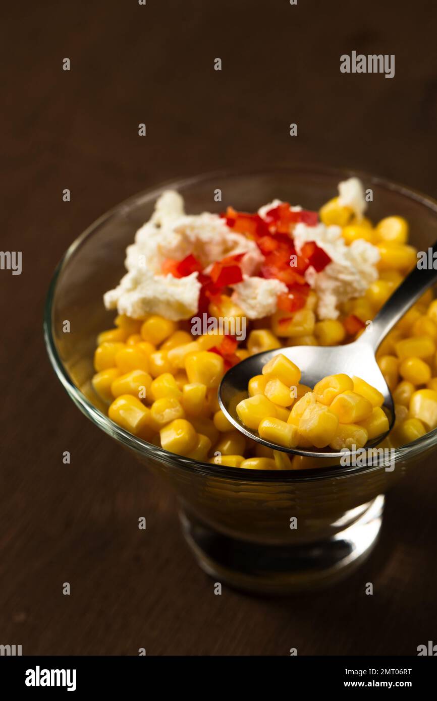 Esquites or Trolley with corn, cheese, mayonnaise and chili in a glass ...