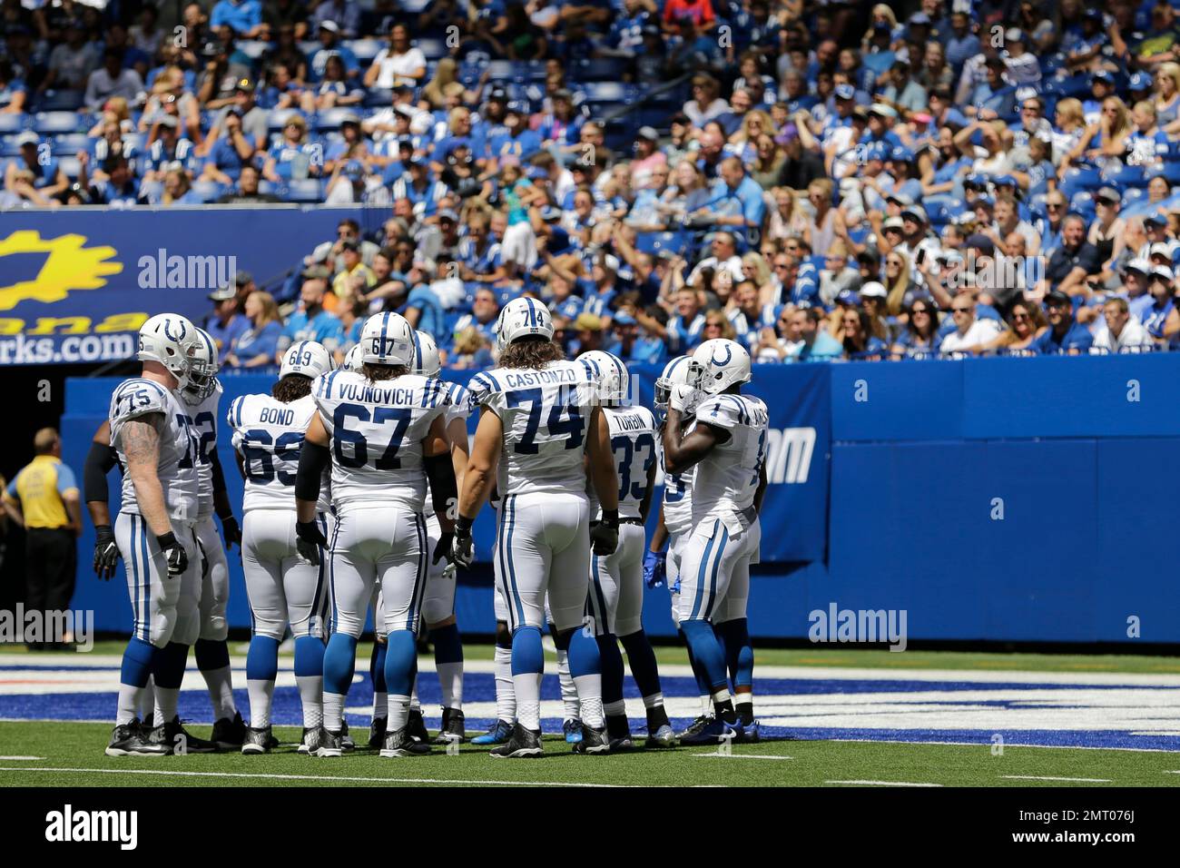 The Indianapolis Colts huddle during the first half of an NFL preseason ...
