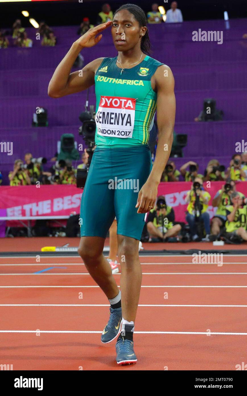 South Africa's Caster Semenya salutes as she celebrates after winning ...