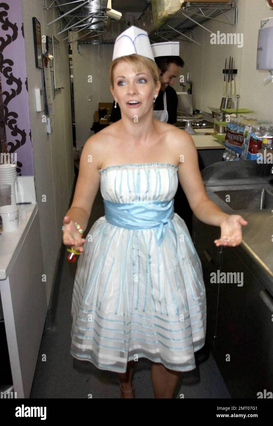 Actress Melissa Joan Hart is all smiles as she hosts the grand opening ...