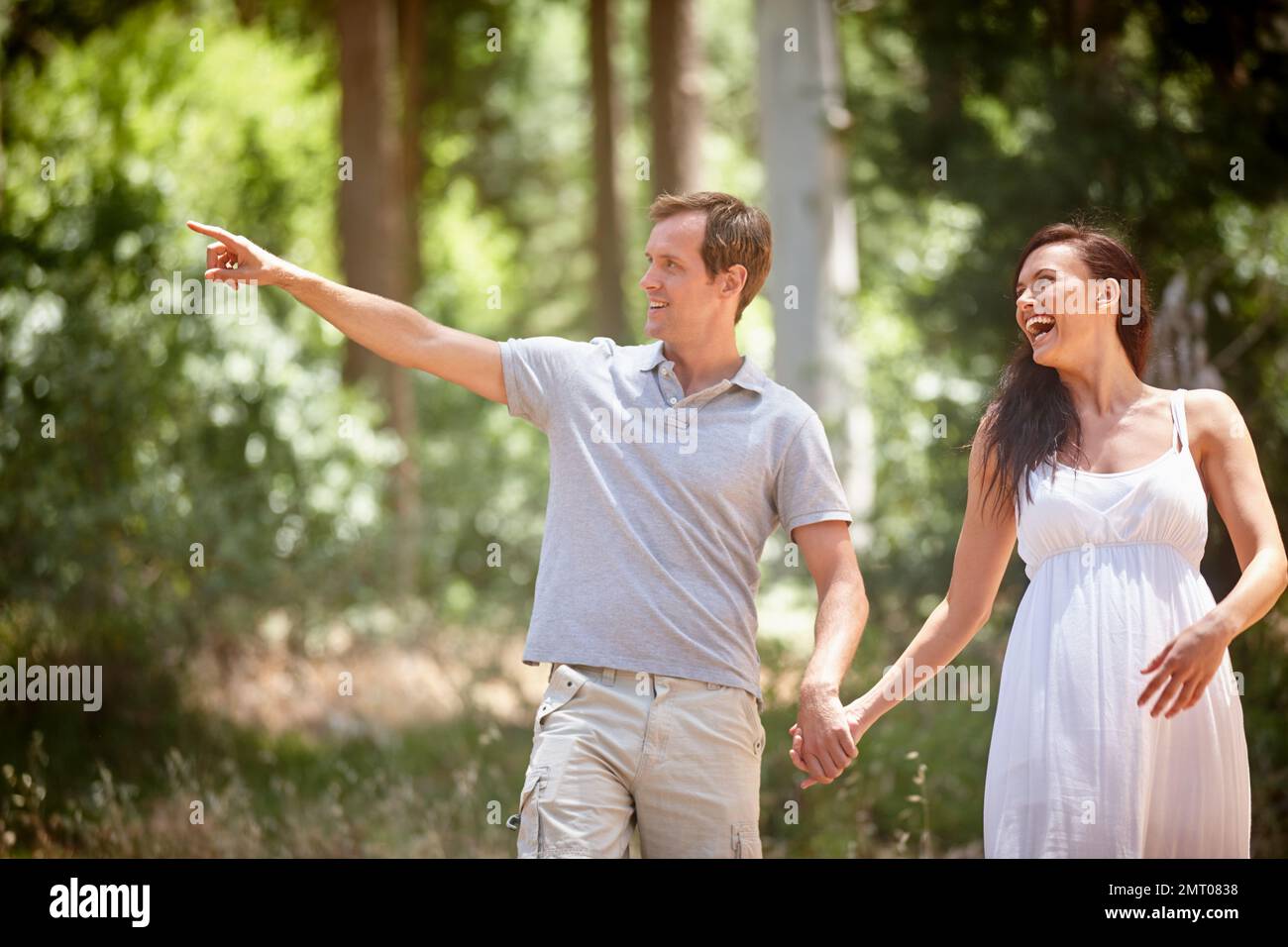 Remember to explore. a happy couple enjoying a carefree day together in ...