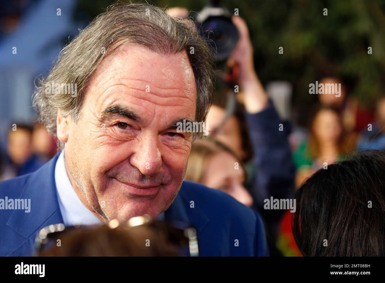 American screenwriter, film director, and producer Oliver Stone walks ...