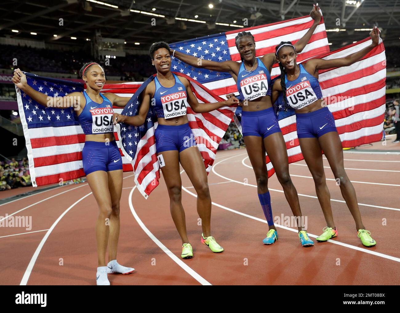 The gold medal winning US relay team, from left, Allyson Felix, Phyllis ...
