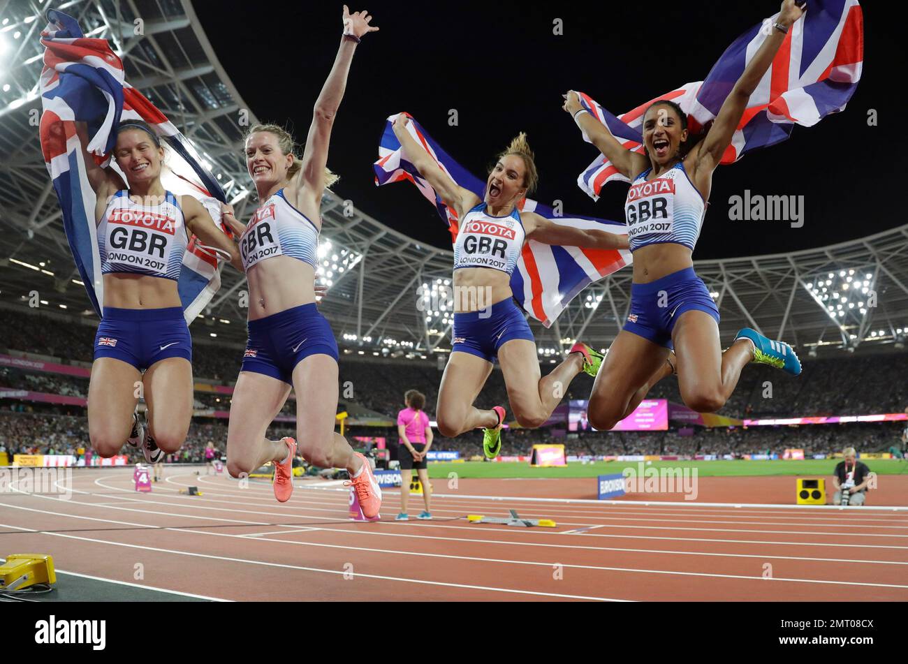 Britain's silver medal winning relay team, from left, Zoey Clark ...