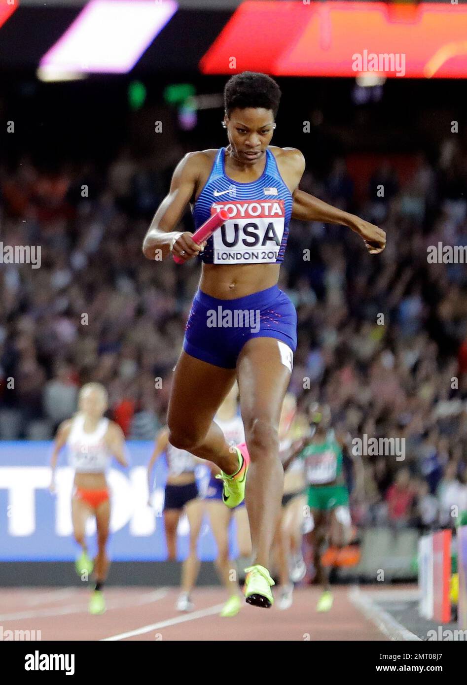 United States' Phyllis Francis celebrates after anchoring the team to ...