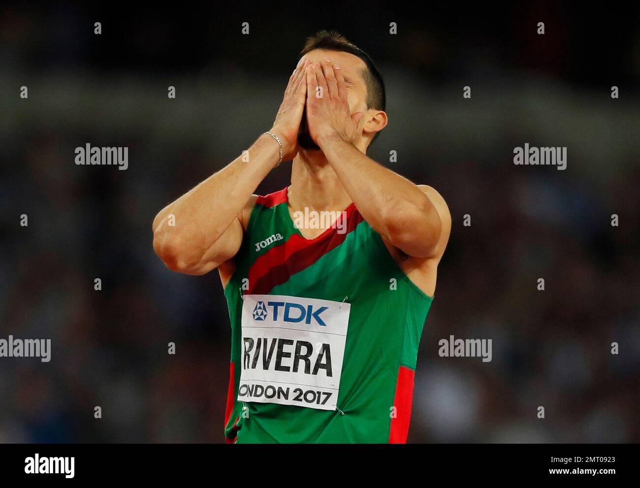 Mexico's Edgar Rivera covers his face after a failed attempt in the men ...