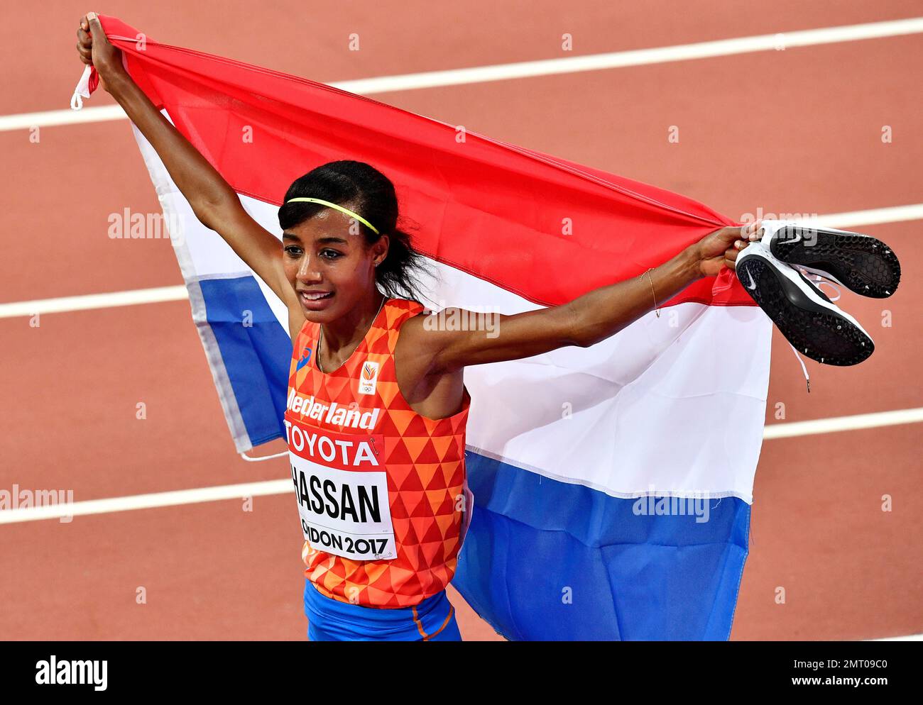 Netherlands' Sifan Hassan celebrates after winning the bronze medal in ...