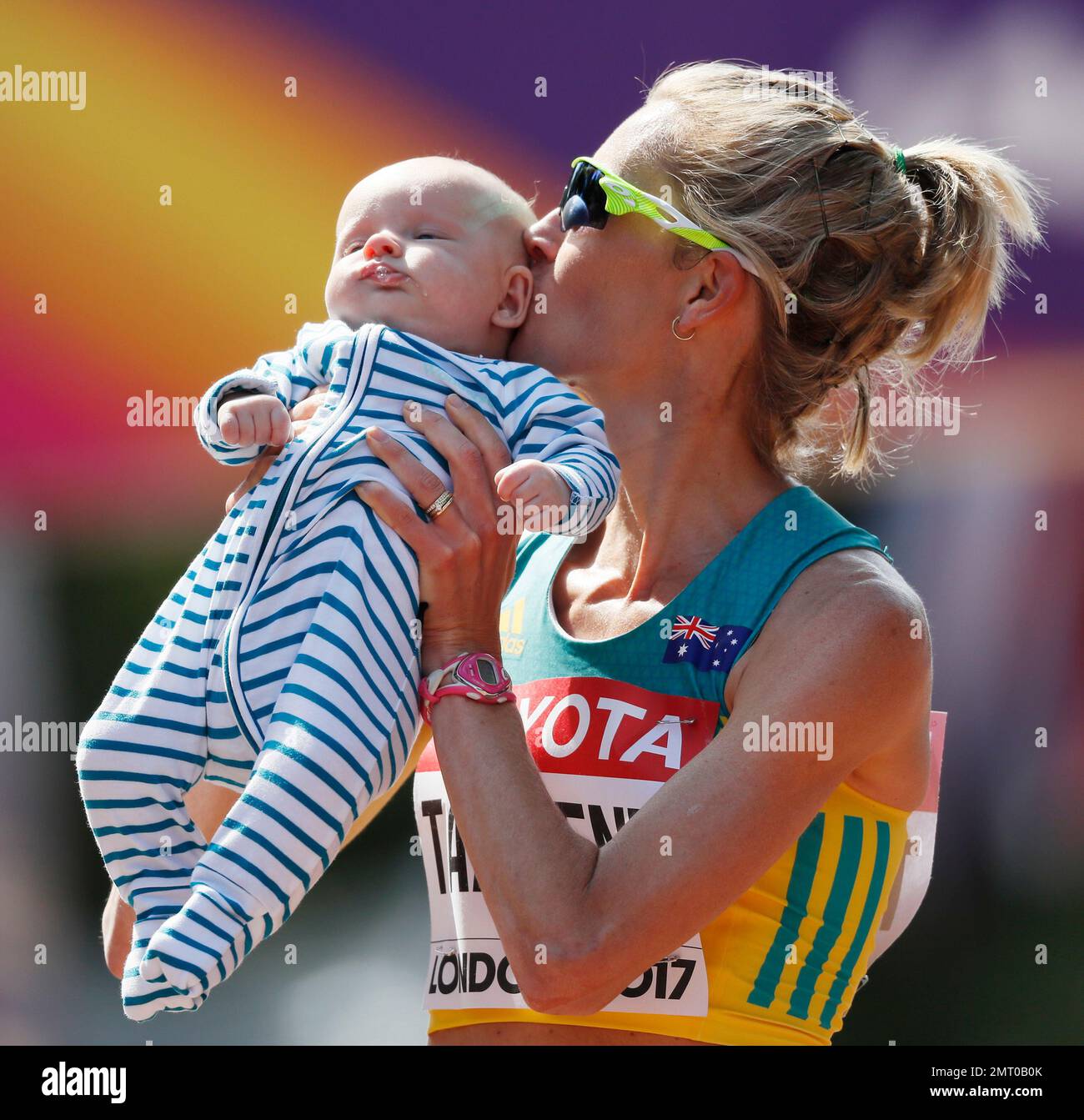 Australia's Claire Tallent kisses her 12-weeks-old son Harvey after ...